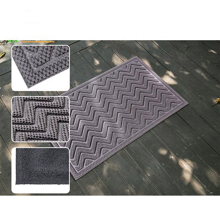Embossed rubber door mat